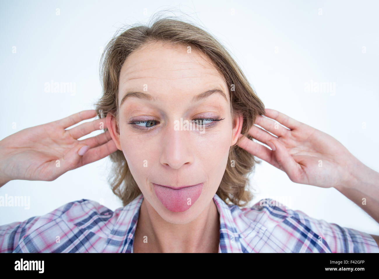 Grimacing grimace face tongue woman hi-res stock photography and images ...
