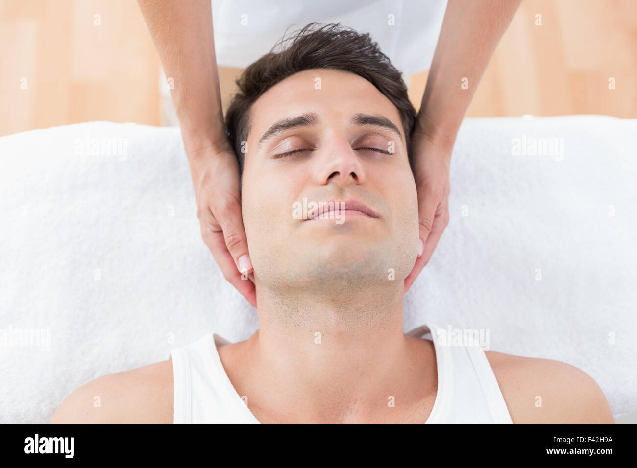 Man receiving neck massage Stock Photo - Alamy