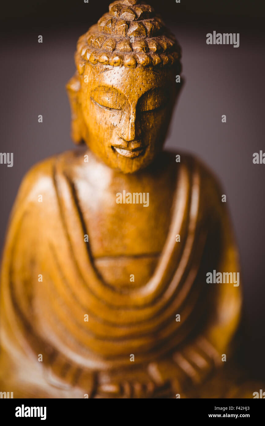 Wooden buddha statue Stock Photo - Alamy
