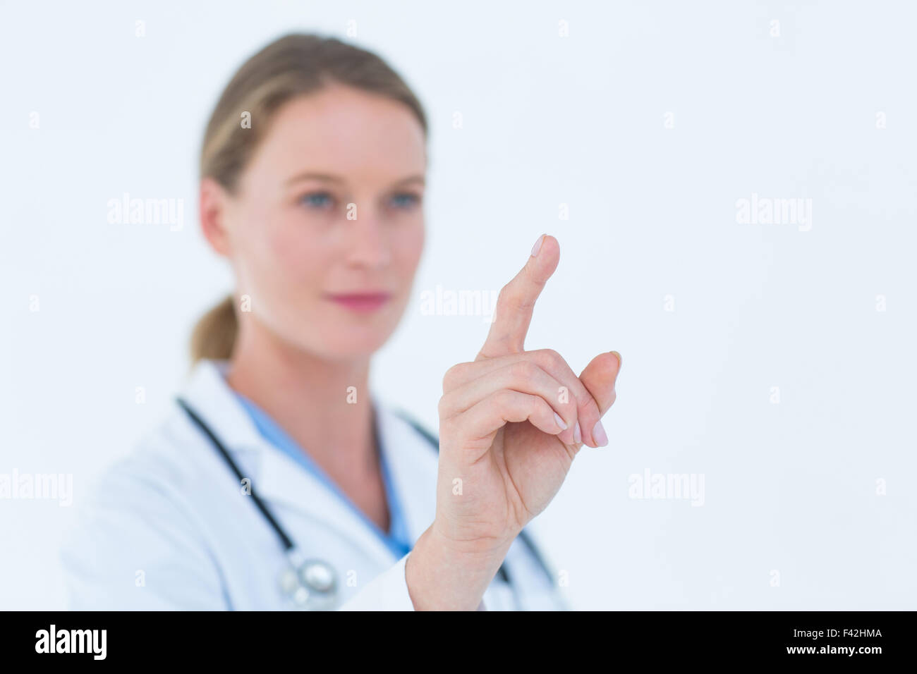 Young doctor touching finger hi-res stock photography and images - Alamy