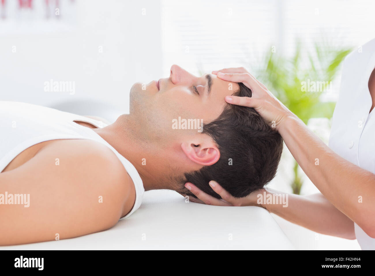 Man receiving head massage Stock Photo - Alamy
