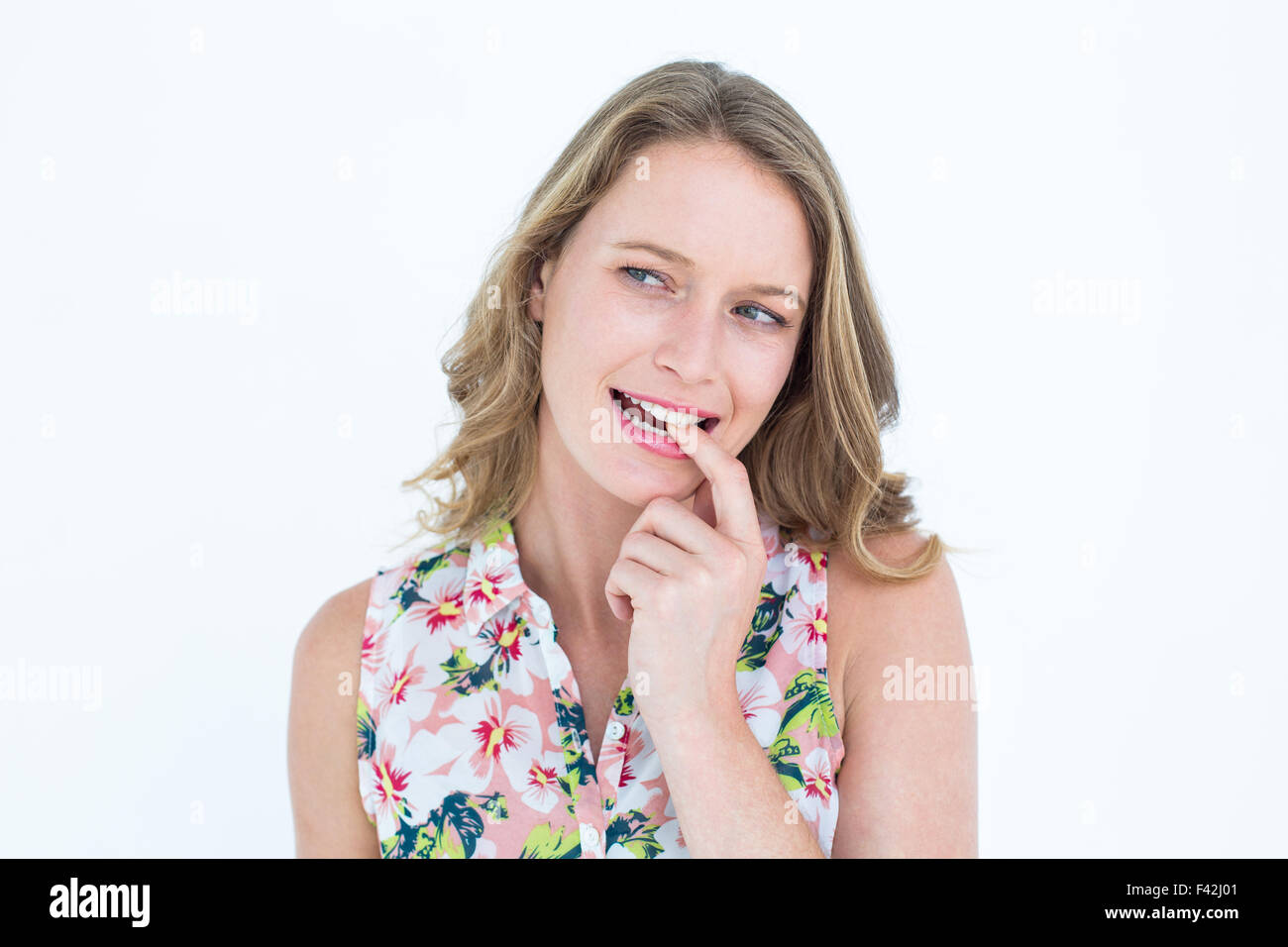 Biting your finger hi-res stock photography and images - Alamy