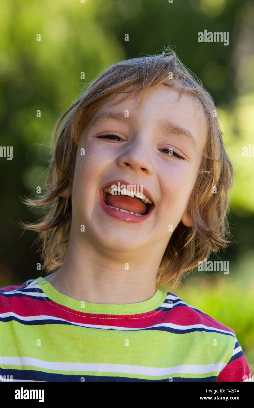 Cute little boy in the park Stock Photo - Alamy
