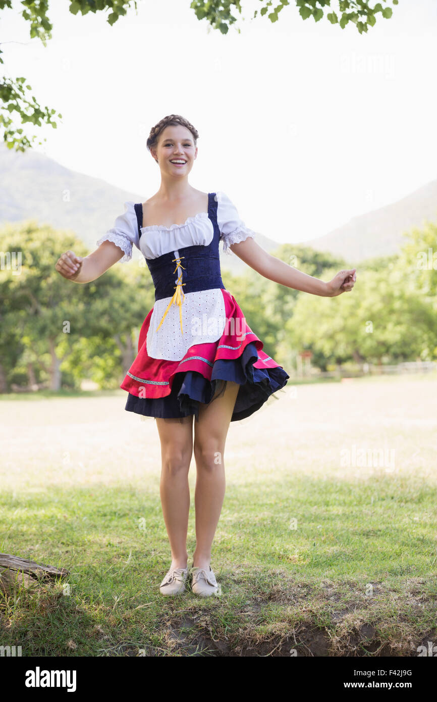 Pretty oktoberfest girl in the park Stock Photo - Alamy