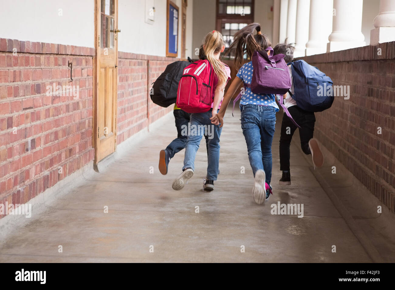 Running down the hallway hi-res stock photography and images - Alamy