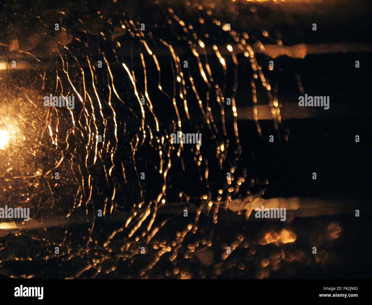 Light behind broken glass Stock Photo - Alamy