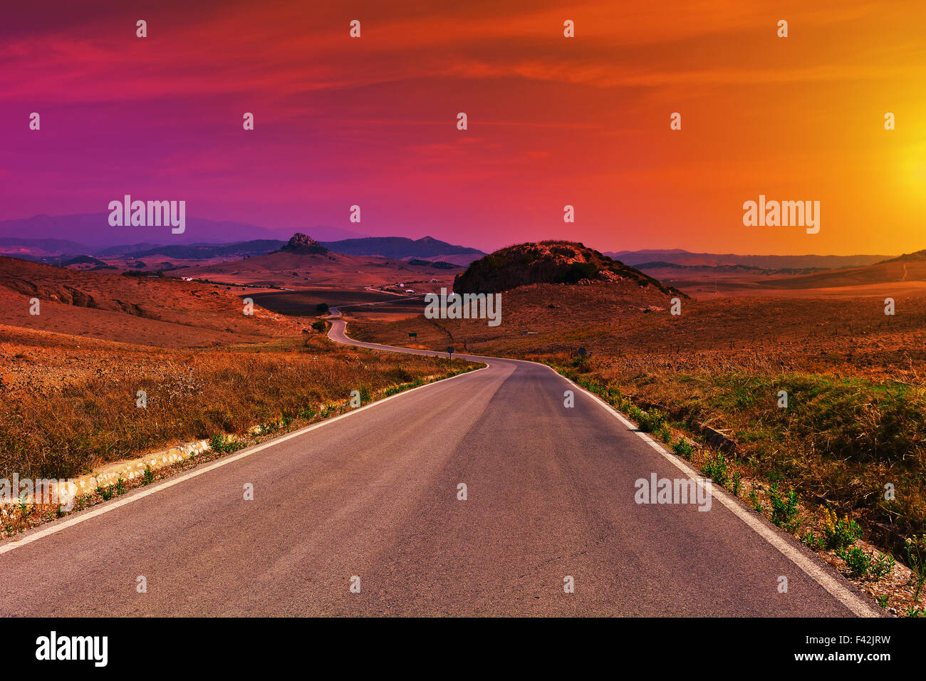 Road at Sunset Stock Photo - Alamy
