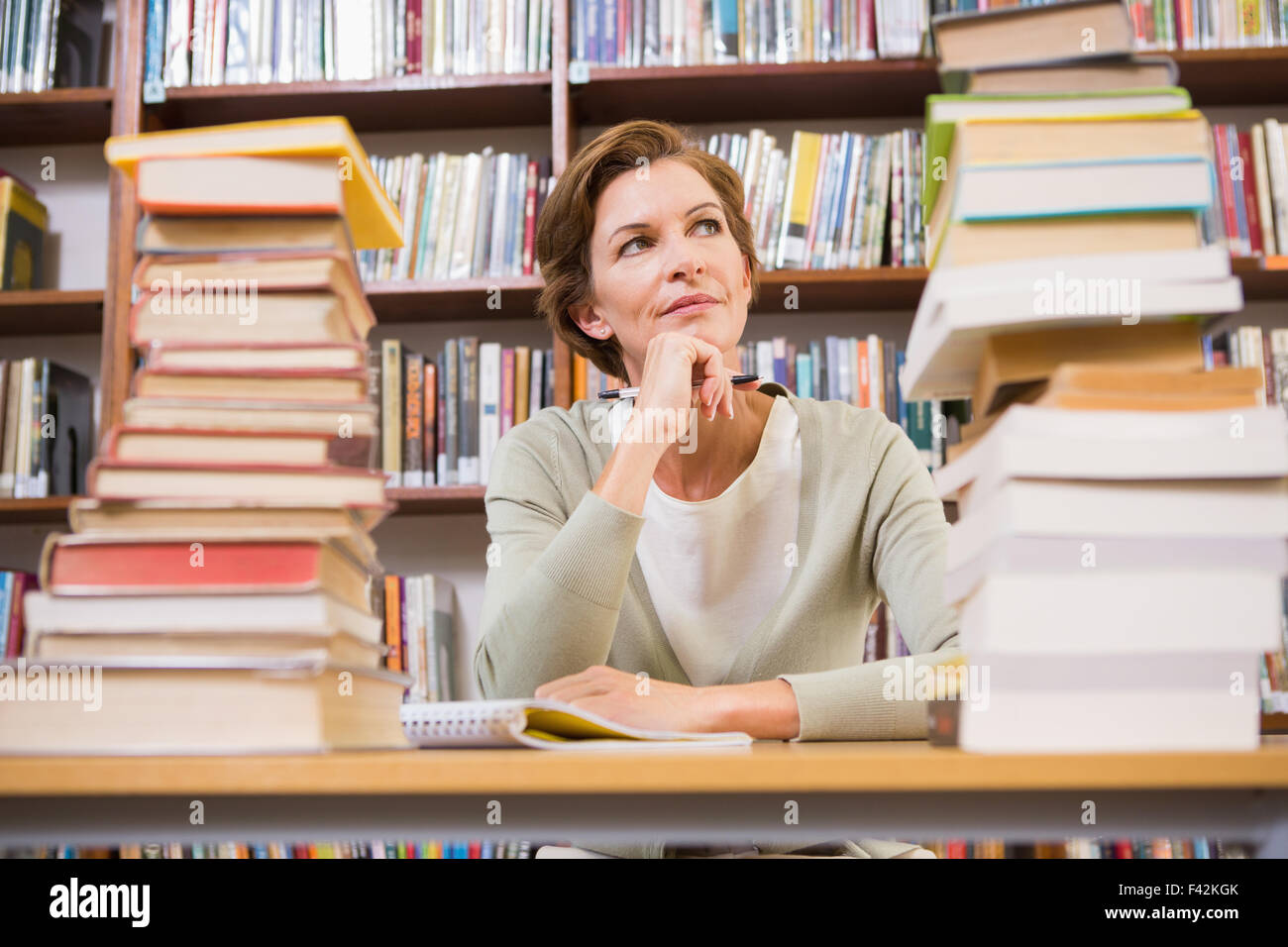 Thoughtful teacher hi-res stock photography and images - Alamy