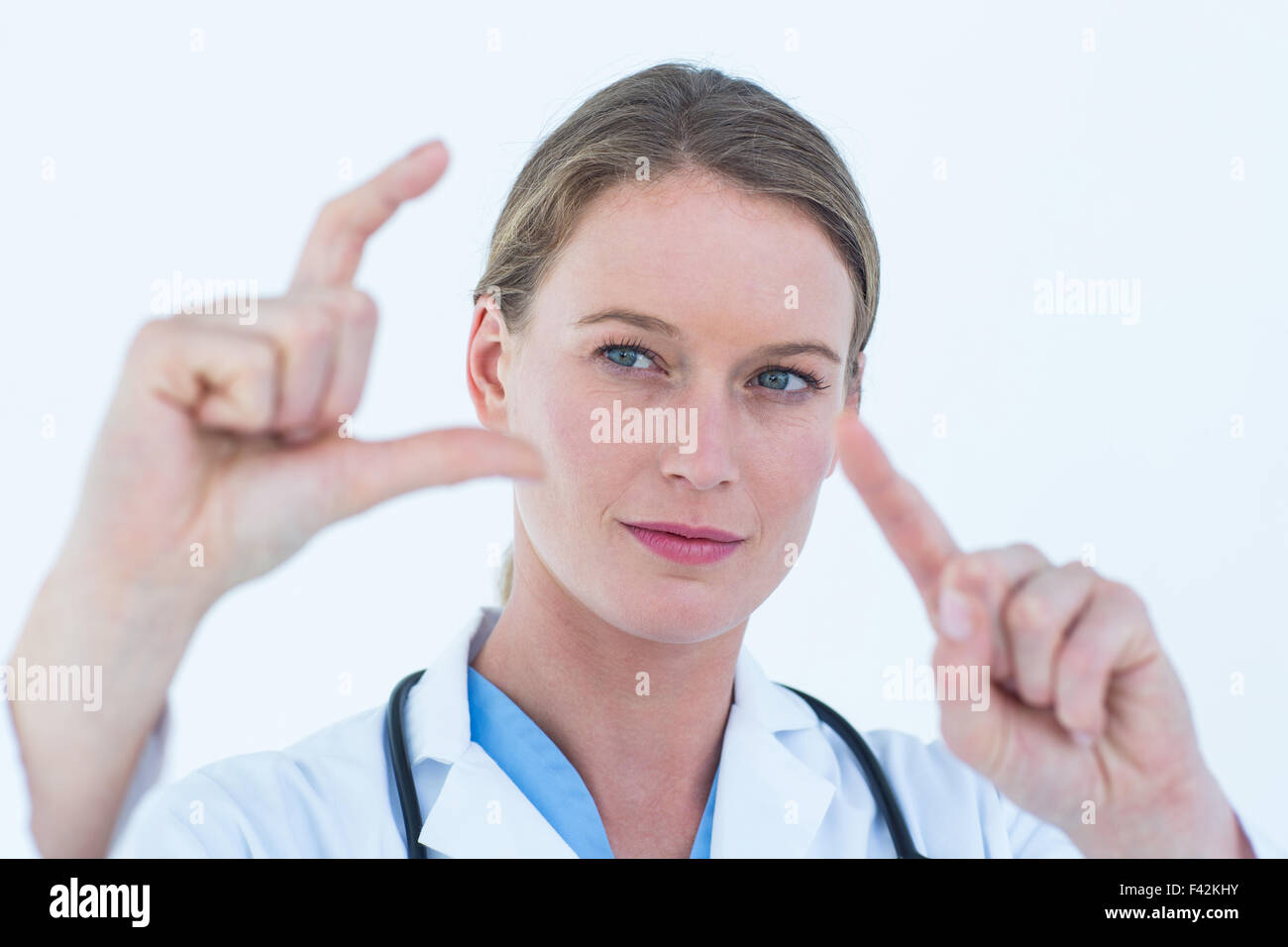 Doctor showing with finger Stock Photo - Alamy