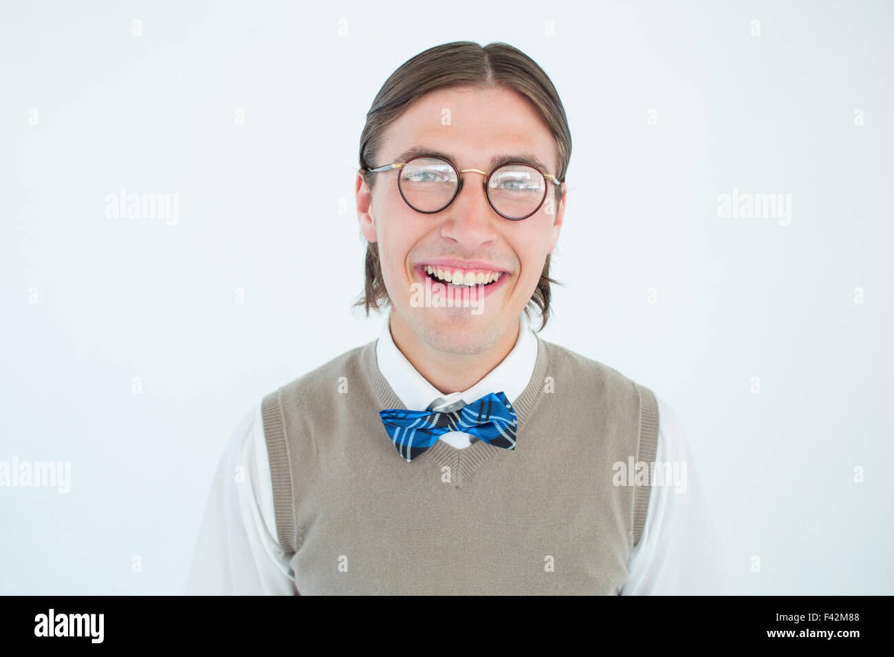 Geeky hipster smiling at camera Stock Photo - Alamy