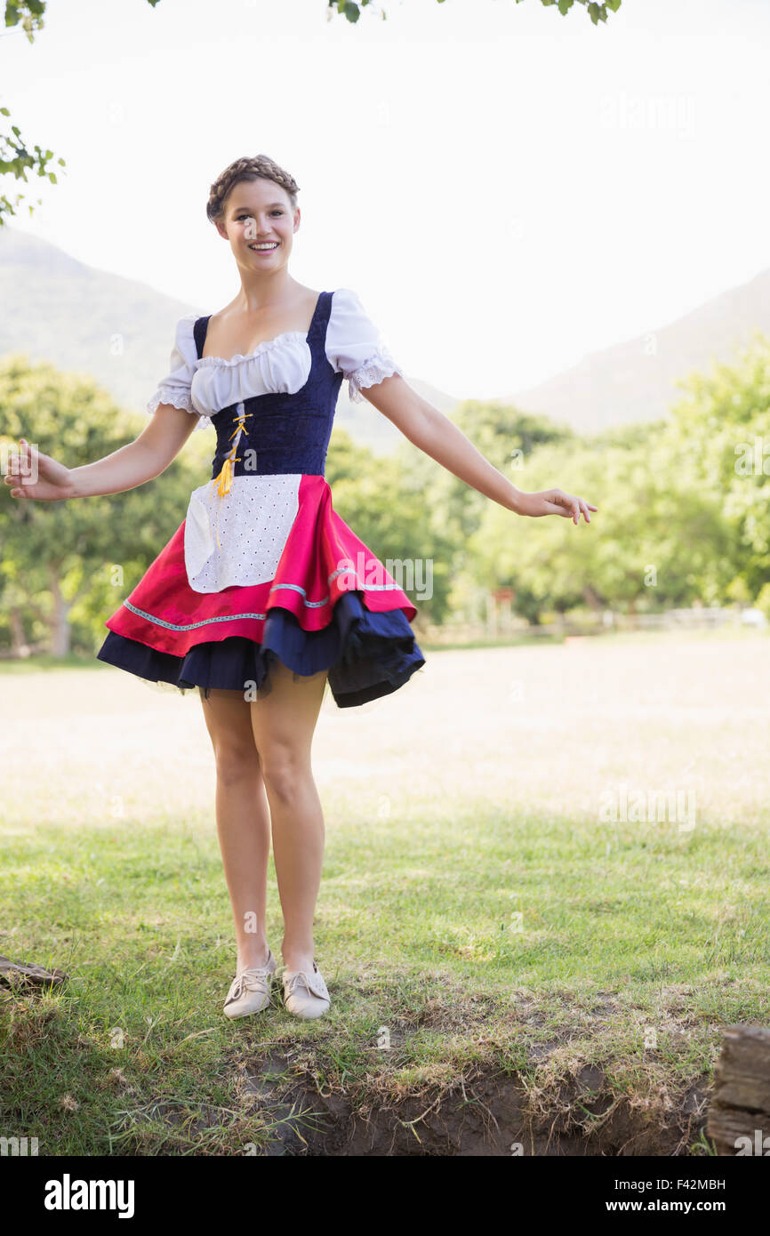 Pretty oktoberfest girl in the park Stock Photo - Alamy