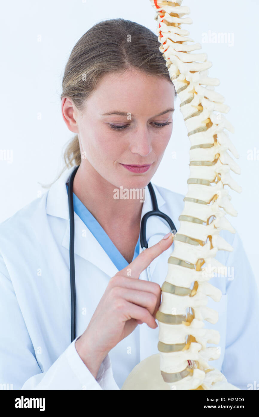 Female doctor examining spine hi-res stock photography and images - Alamy