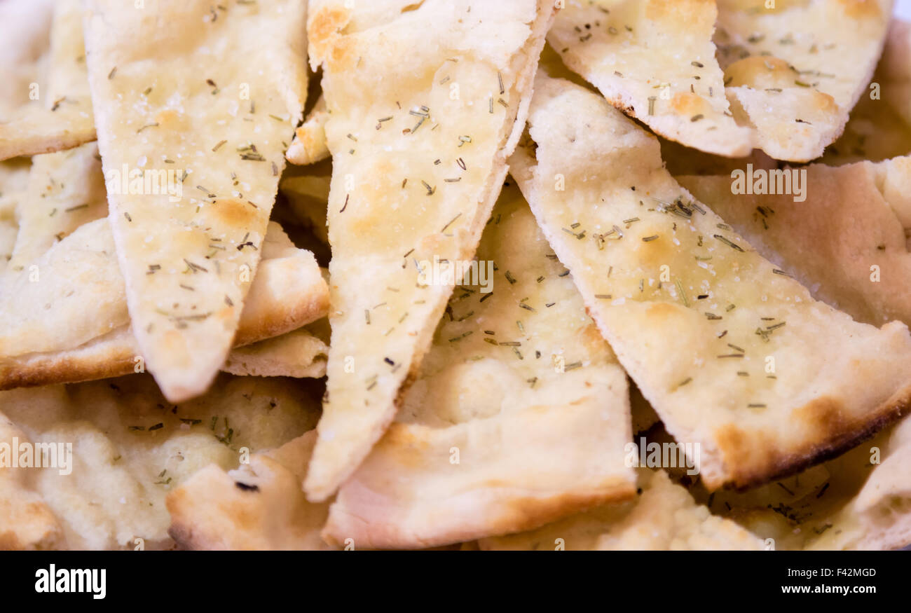 pizza slices with condiment Stock Photo - Alamy