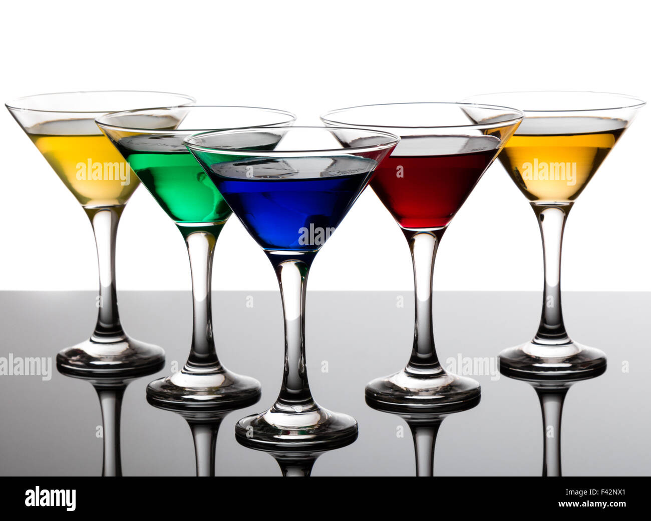 color cocktails in martini glasses Stock Photo - Alamy