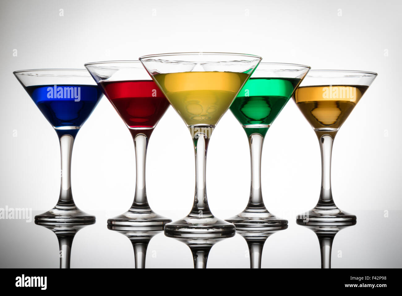 color cocktails in martini glasses Stock Photo - Alamy