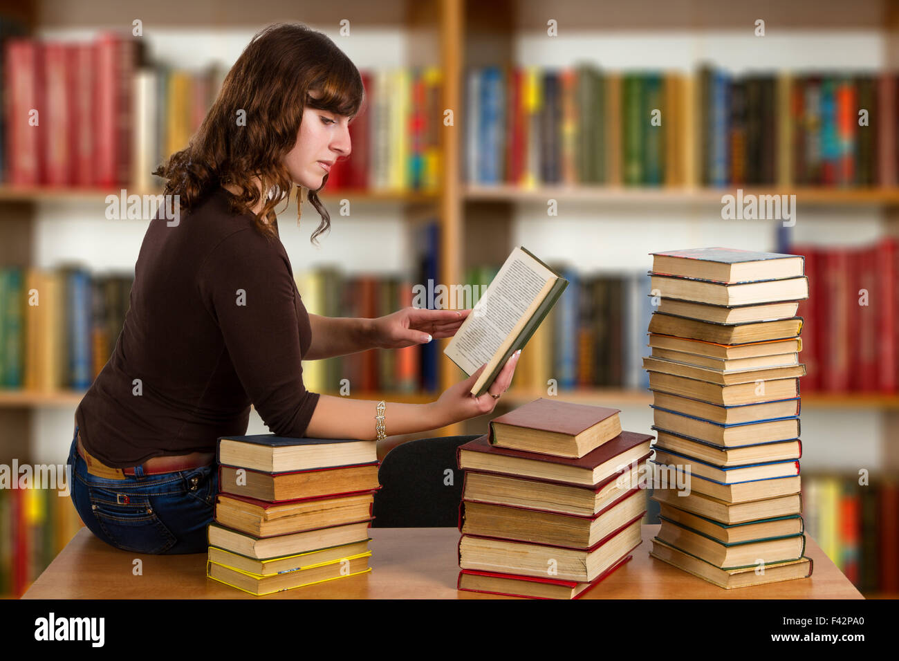 student with open book Stock Photo - Alamy