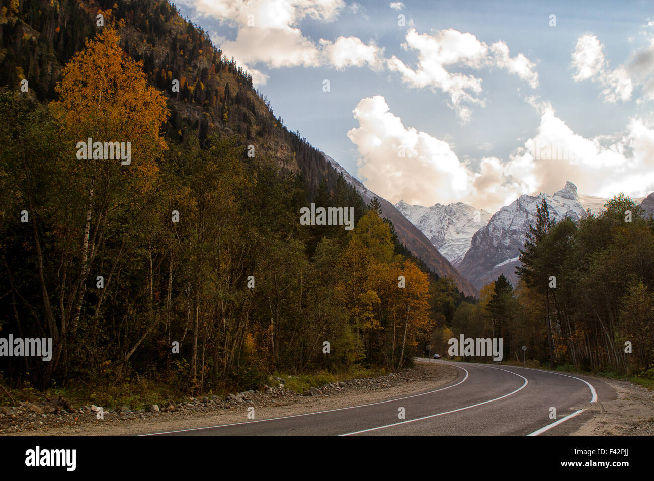 Alpine peaks in clouds hi-res stock photography and images - Alamy
