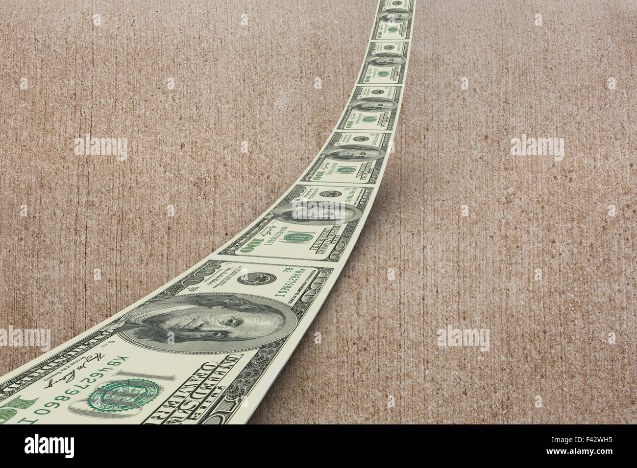 Composite image of dollar road Stock Photo - Alamy