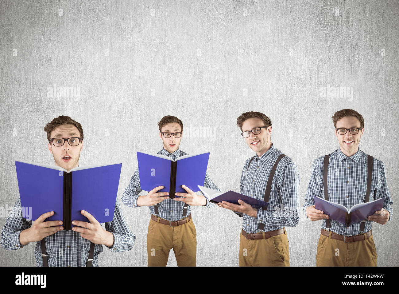 Composite image of nerd with notepad Stock Photo - Alamy
