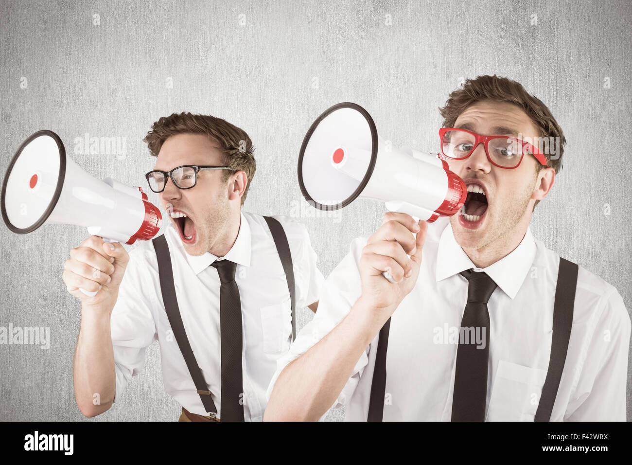 Composite image of nerd with megaphone Stock Photo - Alamy