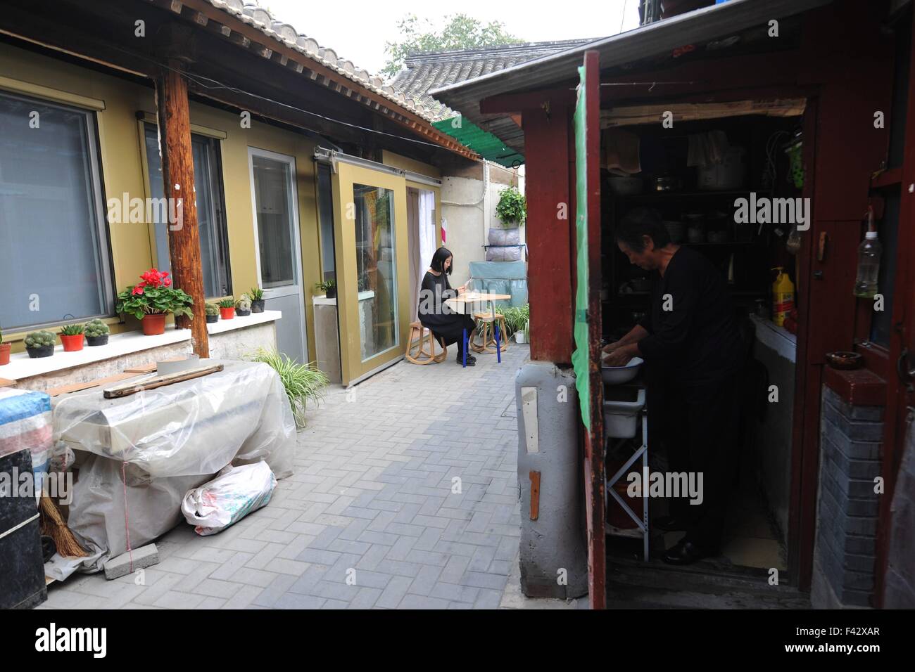 (151014) -- BEIJING, Oct. 14, 2015 (Xinhua) -- A renovated quadrangle ...