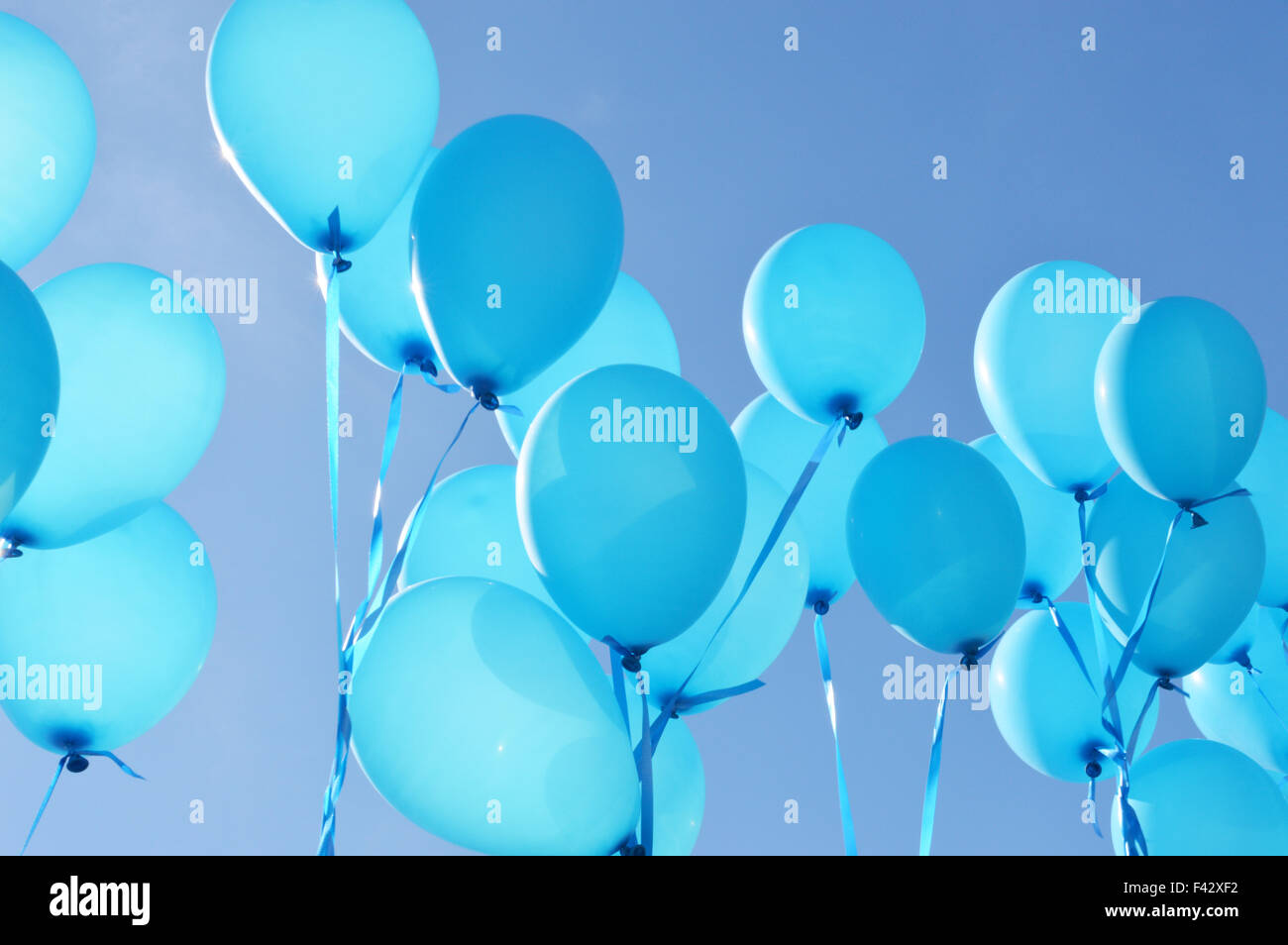 Blue balloons hi-res stock photography and images - Alamy