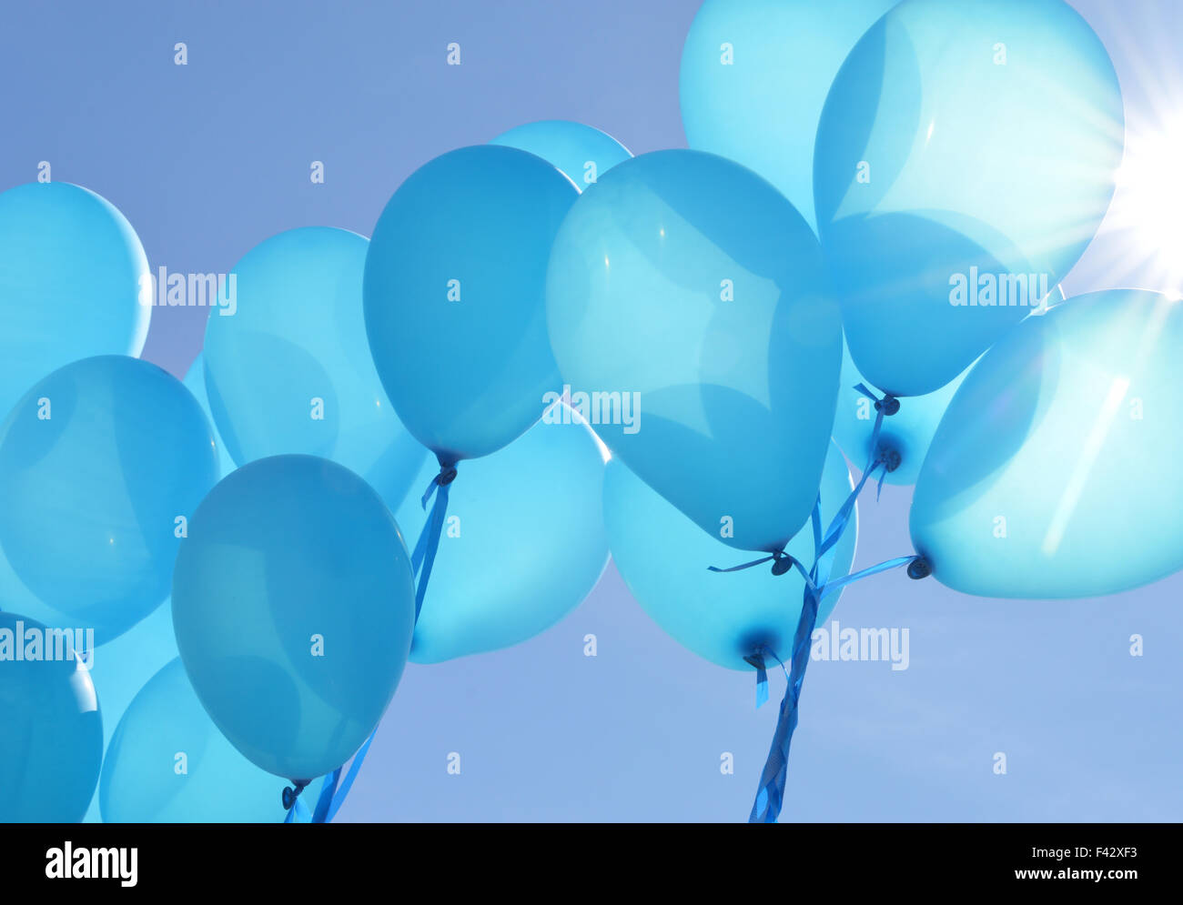 Blue balloons hi-res stock photography and images - Alamy