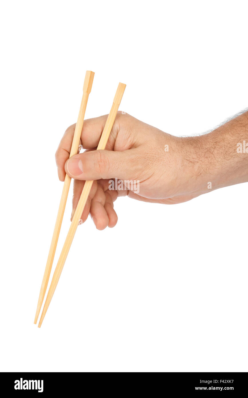 Hand with chopsticks Stock Photo - Alamy