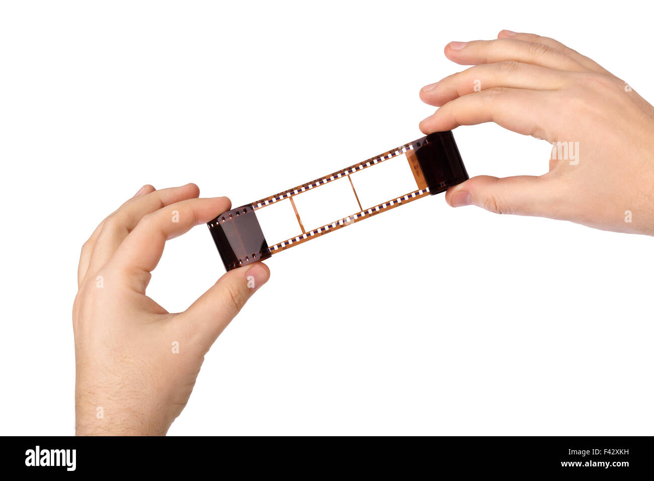 Photographic film in hands Stock Photo - Alamy