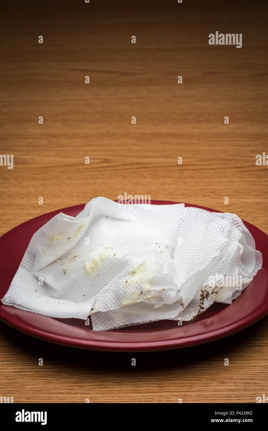 used napkins on plate Stock Photo - Alamy