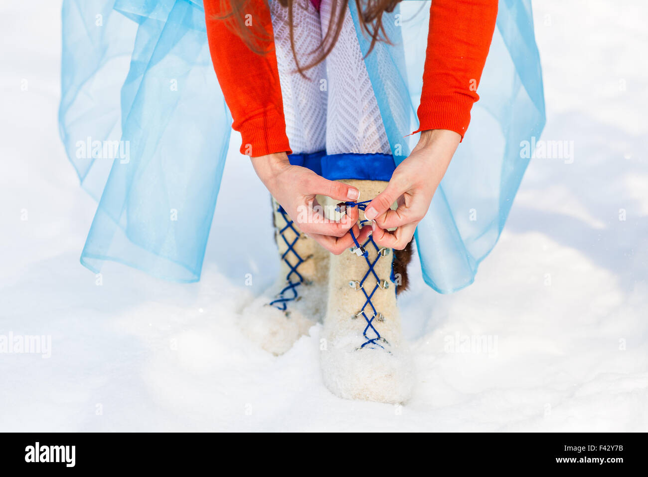 legs standing on the snow snowy winter Stock Photo - Alamy