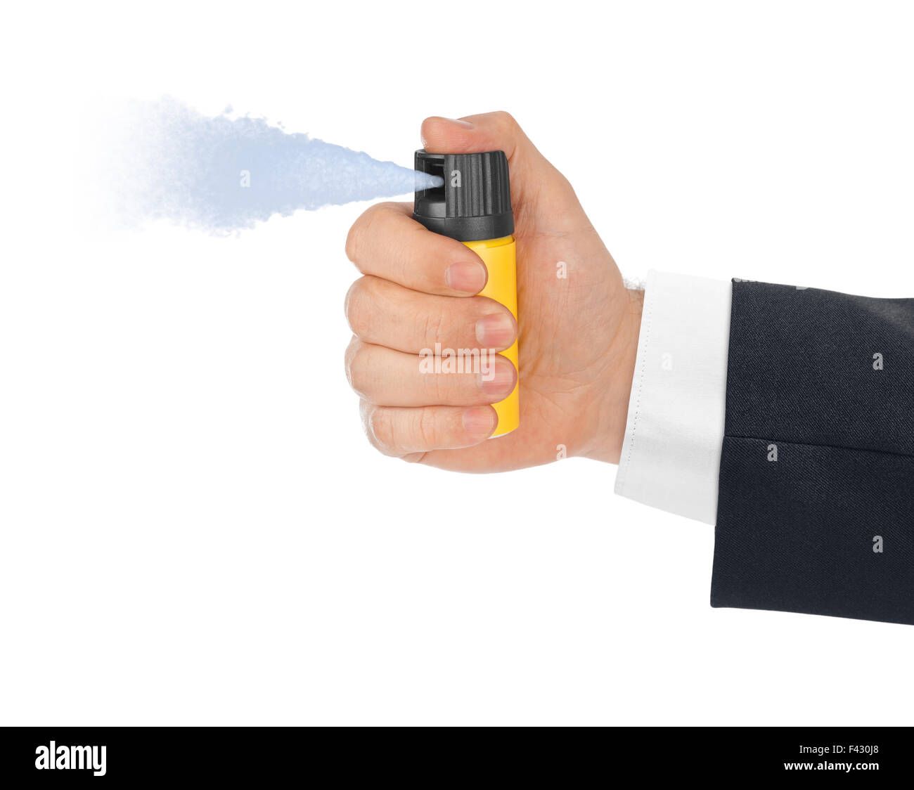 Hand with bottle of pepper spray Stock Photo - Alamy