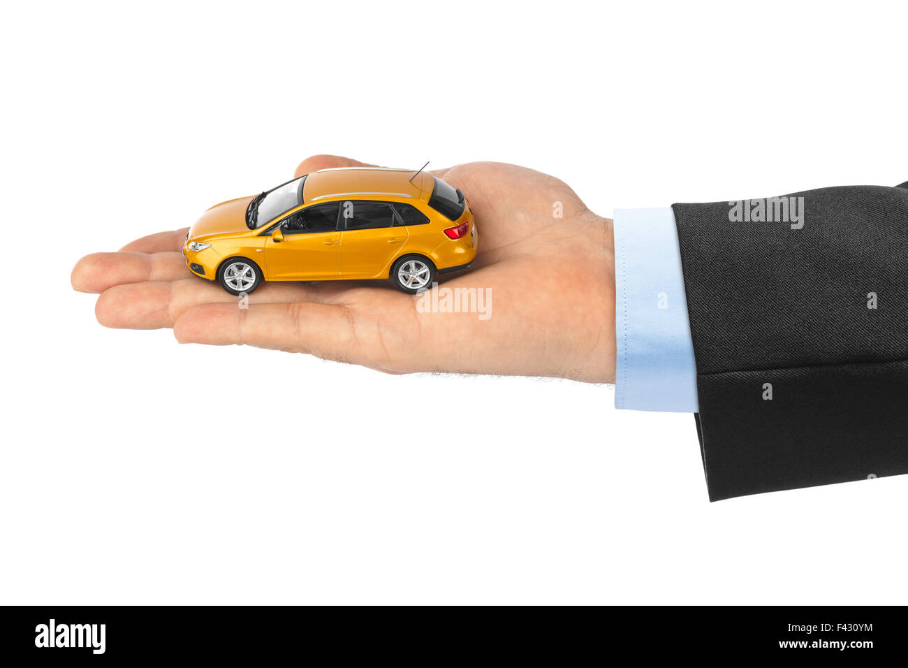 Hand with car Stock Photo - Alamy