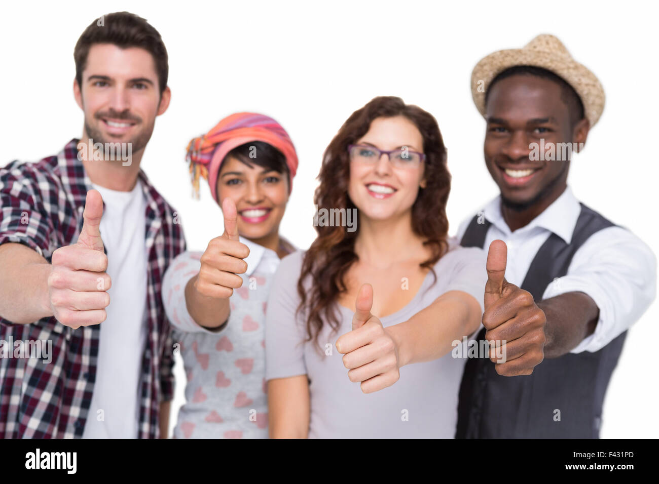Positive teamwork smiling with thumbs up Stock Photo - Alamy