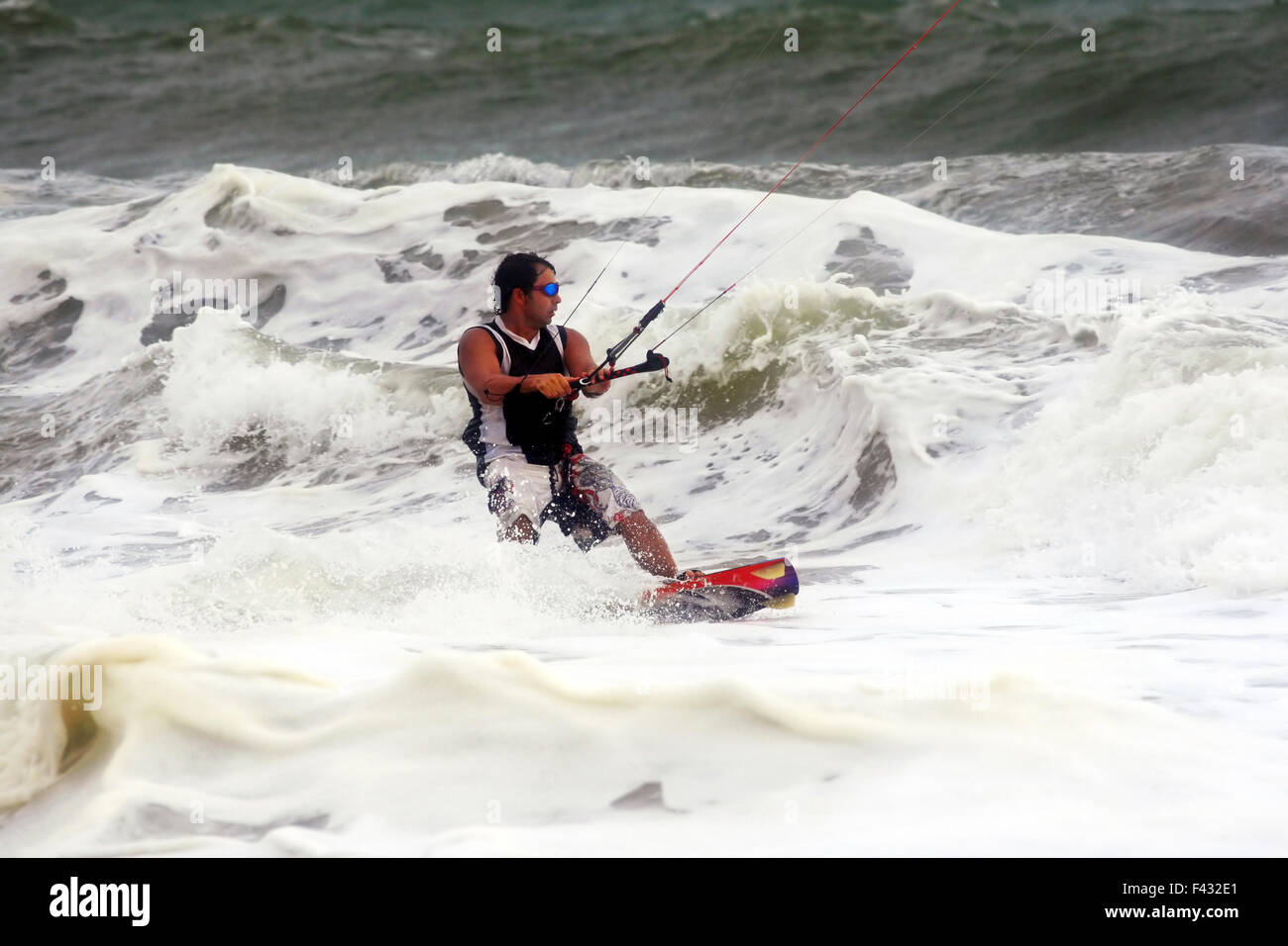 Kitesurfer in action Stock Photo - Alamy