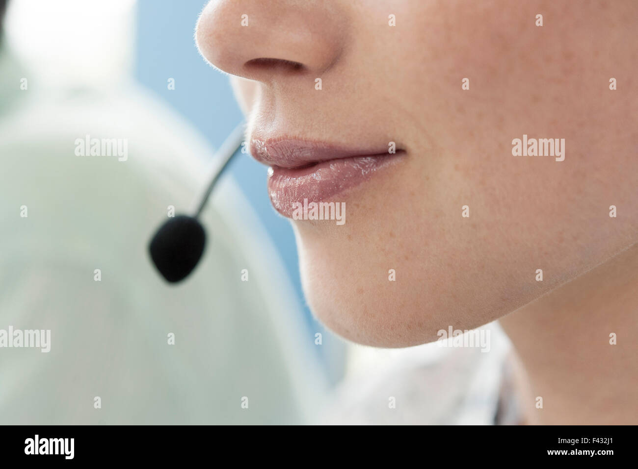 Close-up of operator wearing headset Stock Photo - Alamy