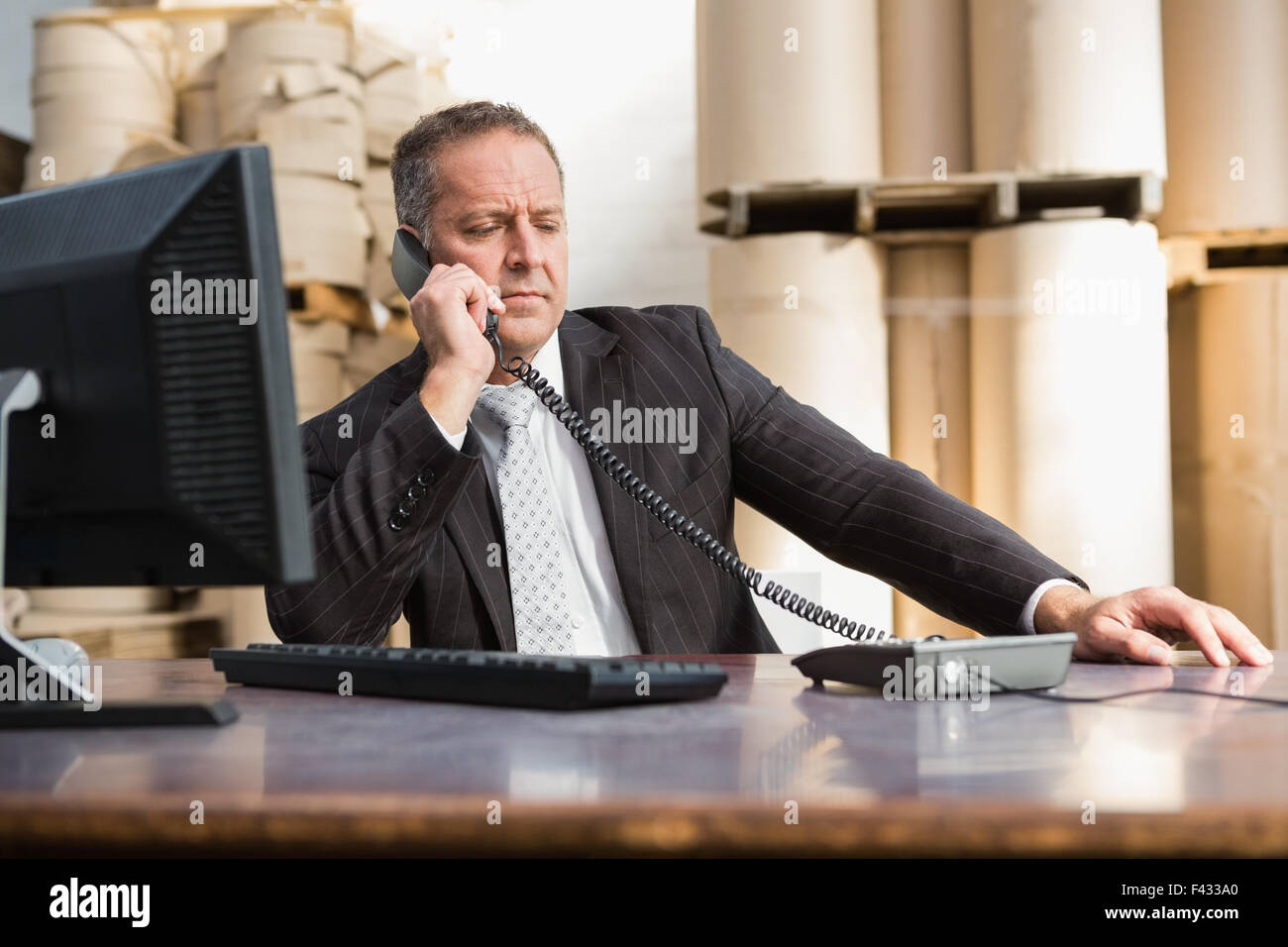 Man using telephone box hi-res stock photography and images - Alamy