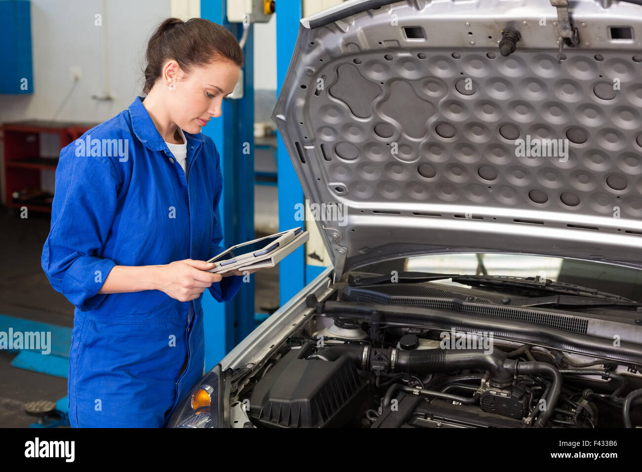 Fix tablet hi-res stock photography and images - Alamy