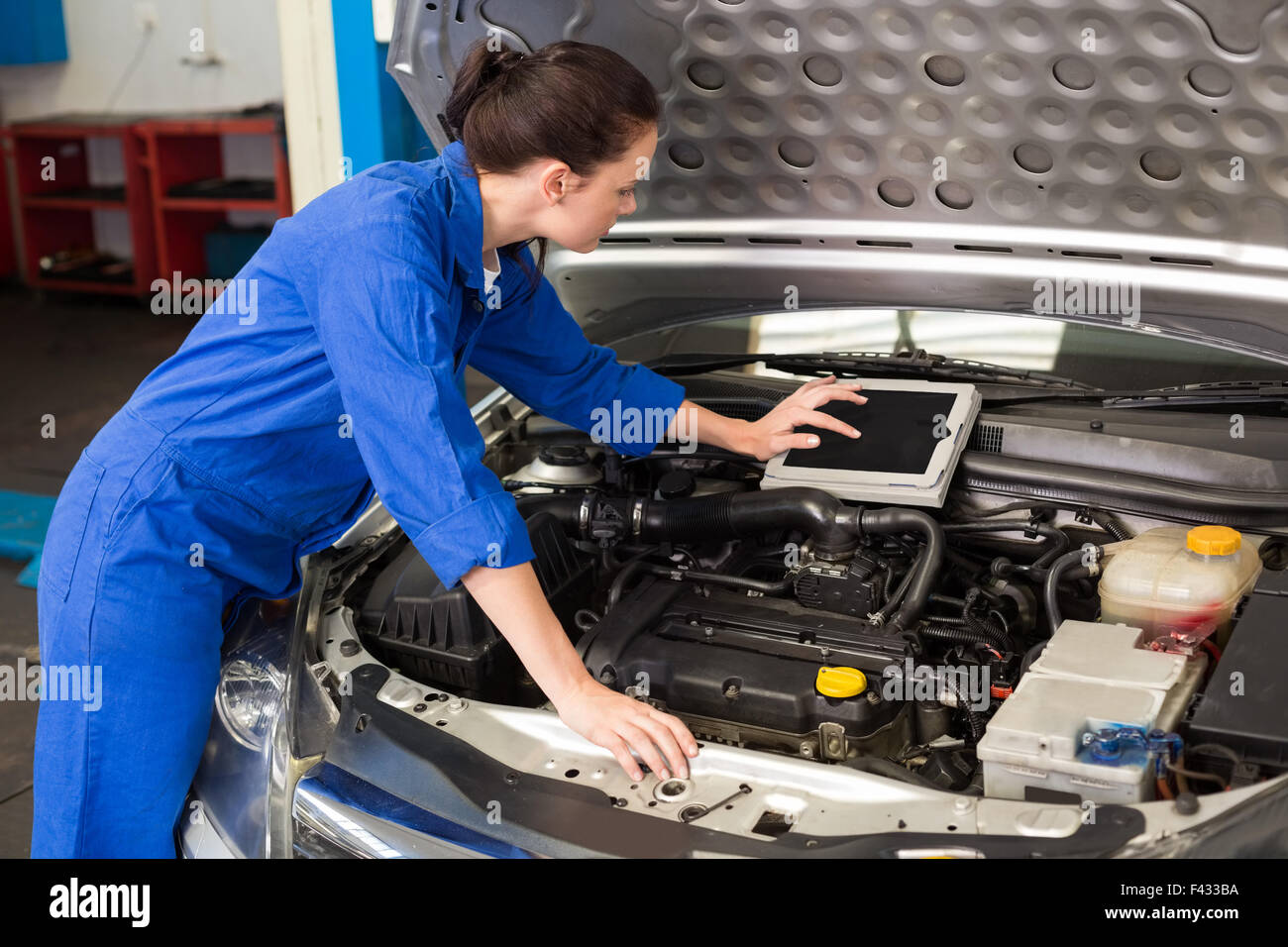 Fix tablet hi-res stock photography and images - Alamy