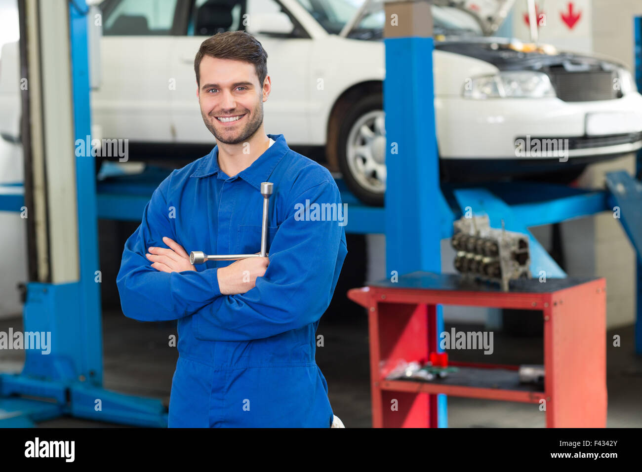 Mechanic looking camera holding hi-res stock photography and images - Alamy