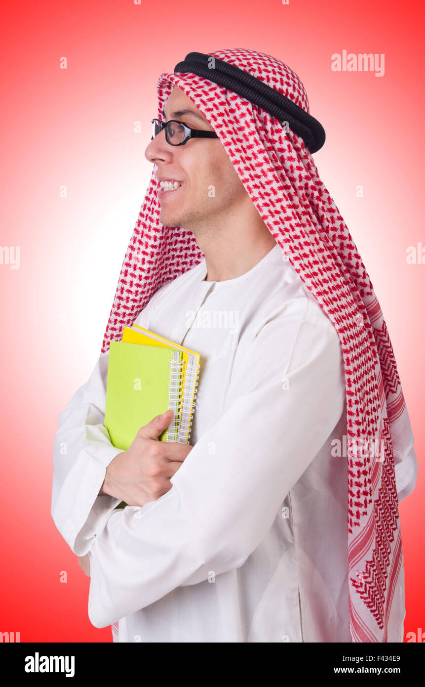 Arab male student reading hi-res stock photography and images - Alamy