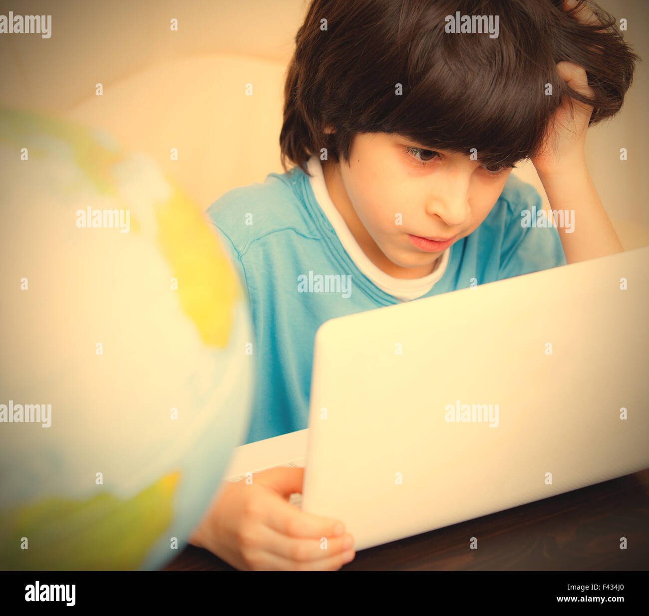 boy with computer Stock Photo - Alamy