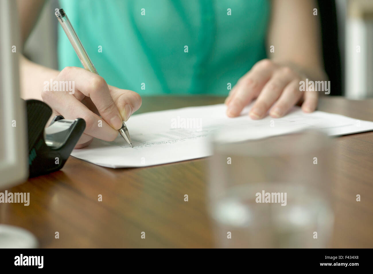 Student doing homework Stock Photo - Alamy
