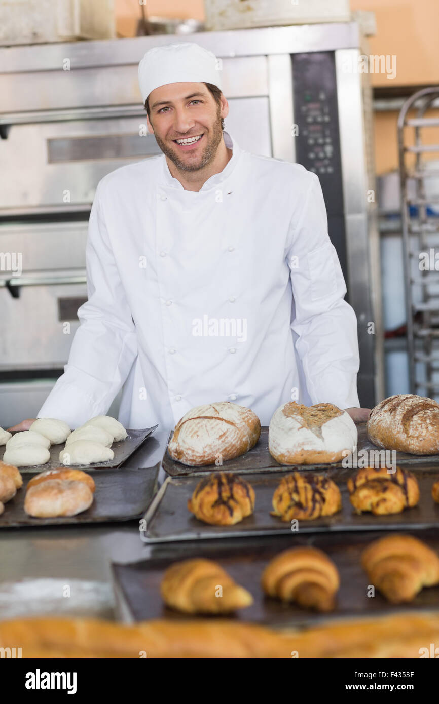 Smiling baker looking at camera Stock Photo - Alamy
