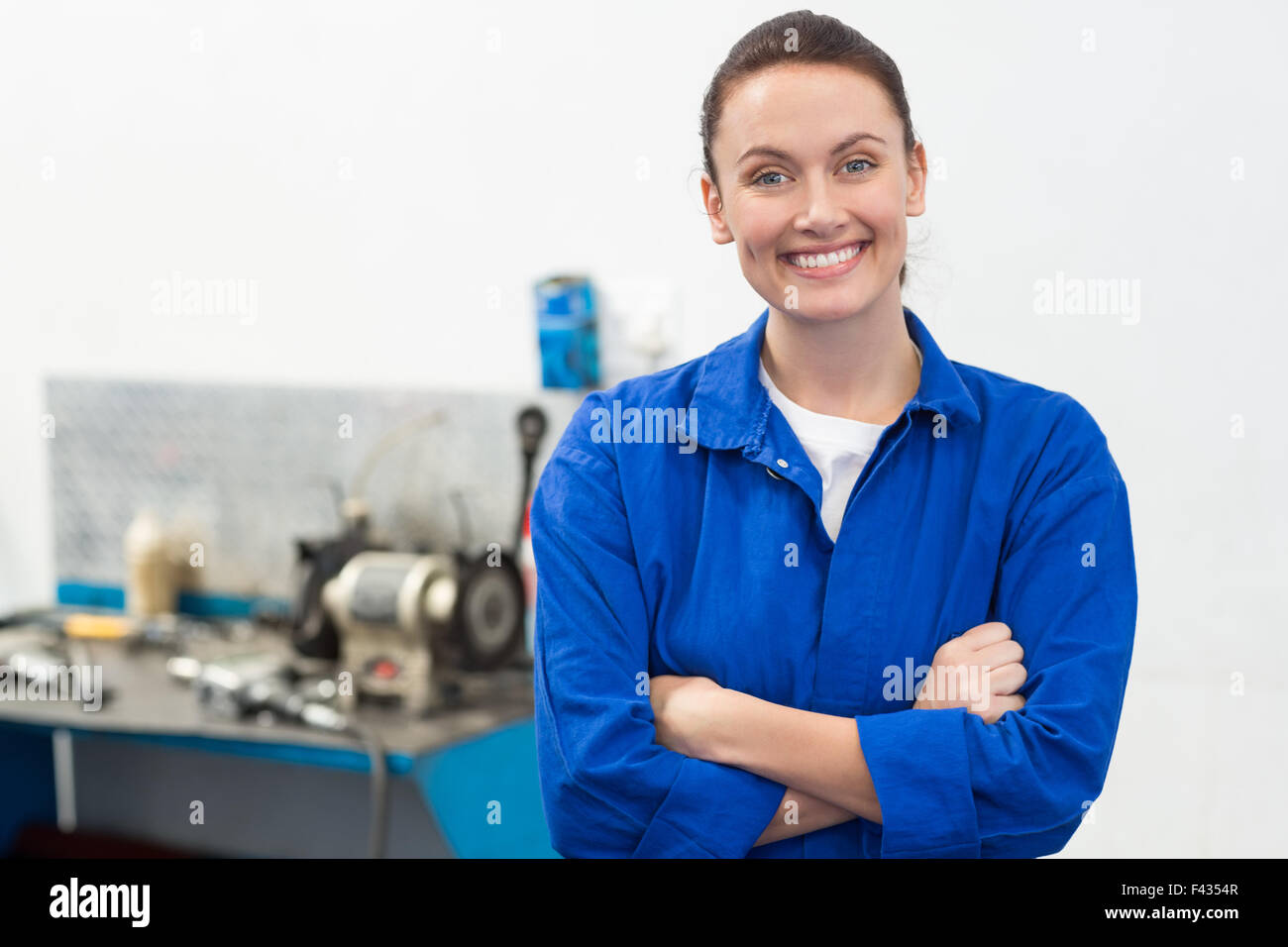Mechanic smiling at the camera Stock Photo - Alamy