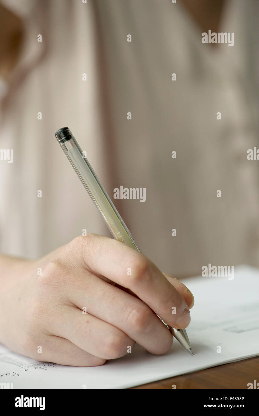 Student doing homework Stock Photo - Alamy