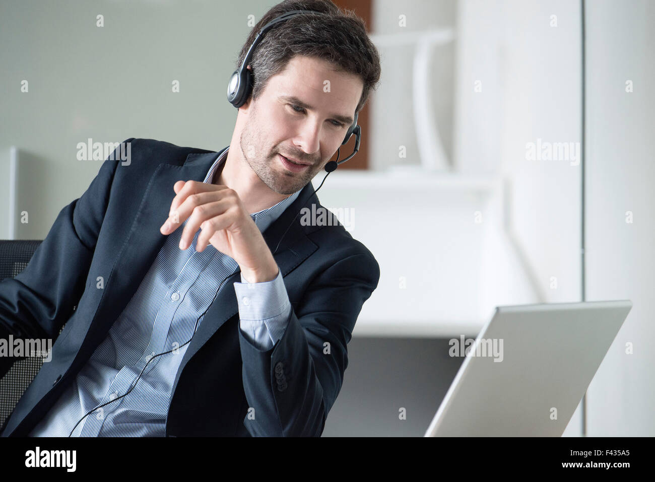 Telemarketer making pitch Stock Photo - Alamy