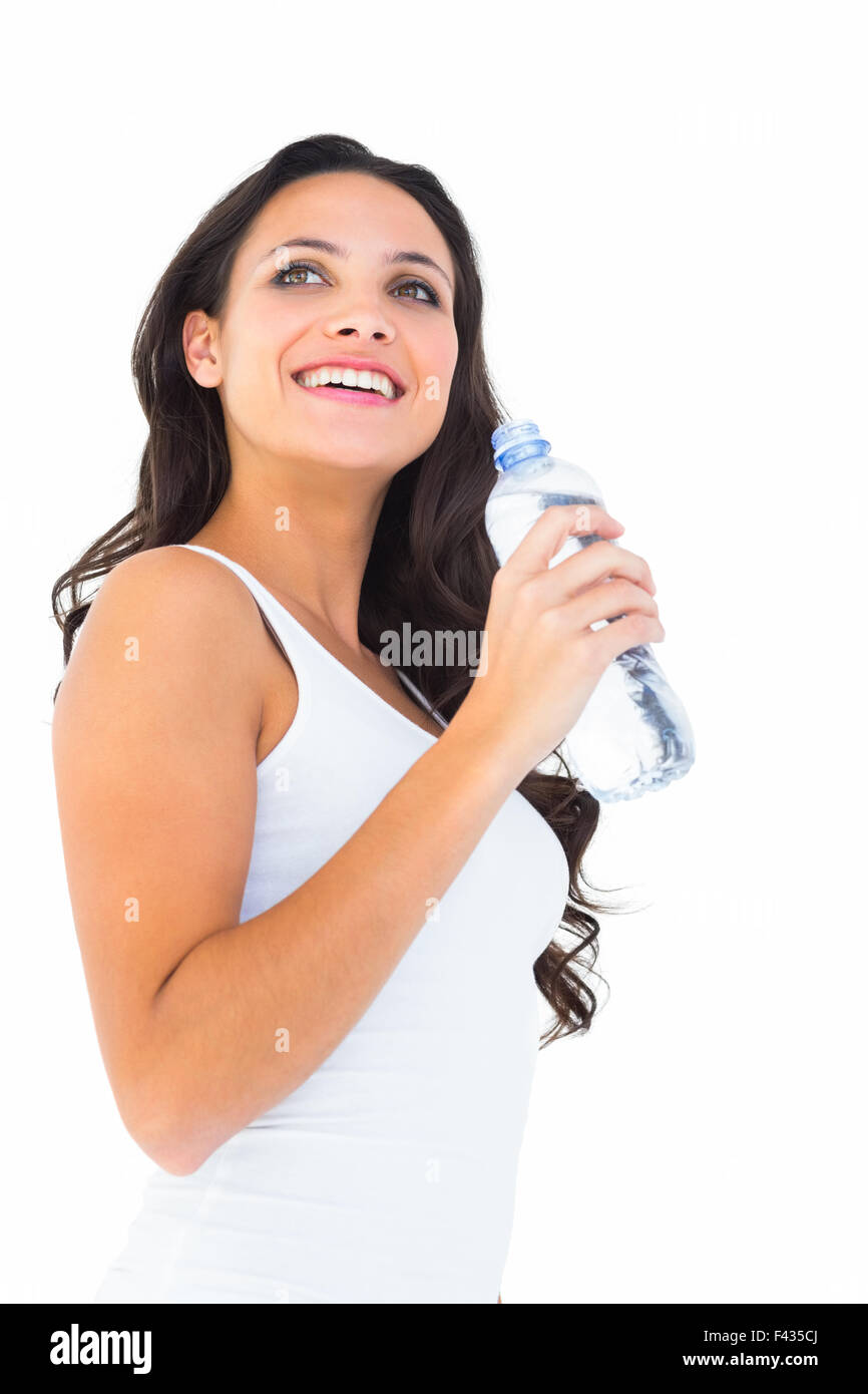Smiling brunette drinking water hi-res stock photography and images - Alamy