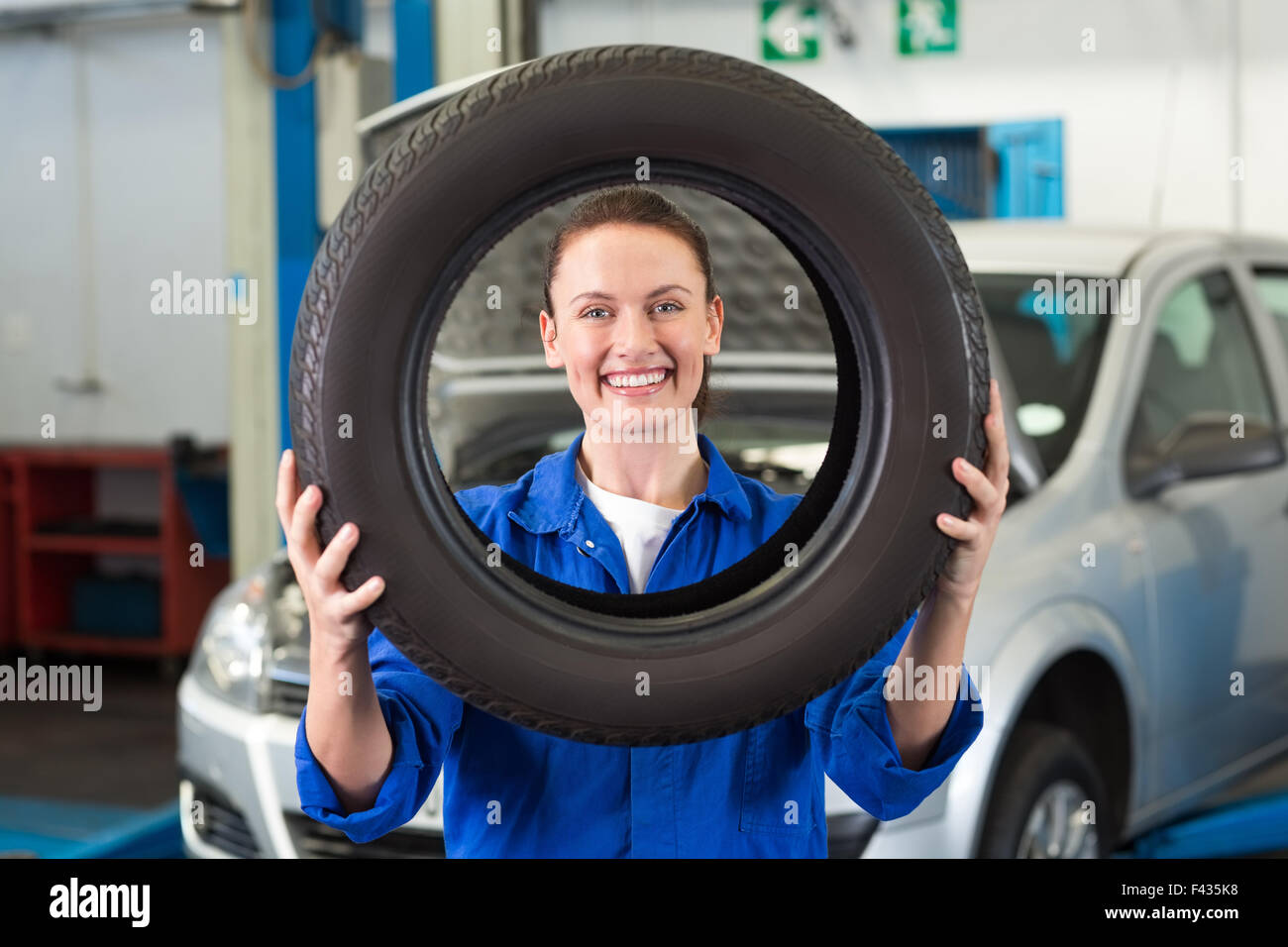 Woman looking at car tire hi-res stock photography and images - Alamy