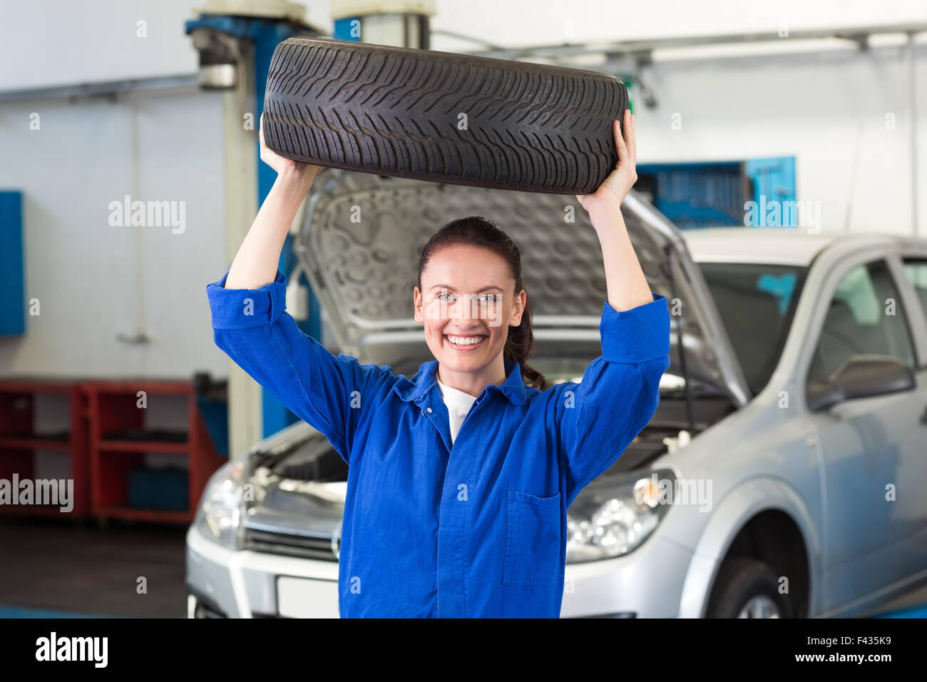Holding tire hi-res stock photography and images - Alamy